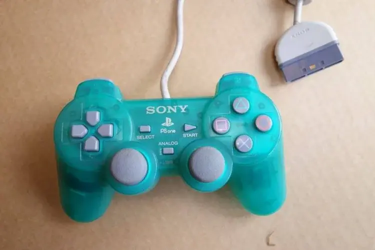 Sony PlayStation Slimline Clear/Blue Controller [NA] - Consolevariations